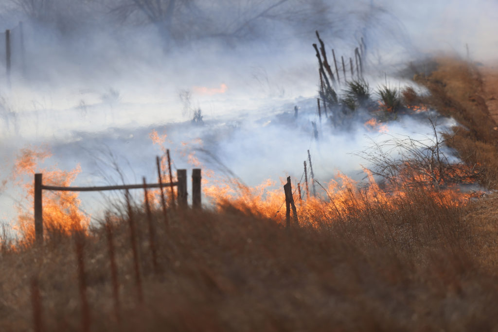 Wind-blown fires burn about 40 square miles in Kansas, closing highways ...